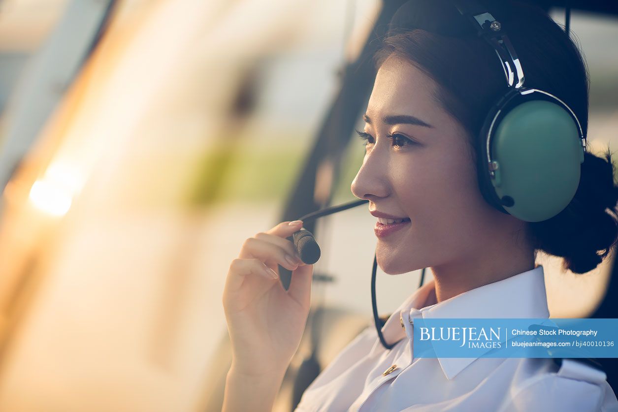 Chinese pilot sitting in helicopter cockpit-High-res stock photo for ...