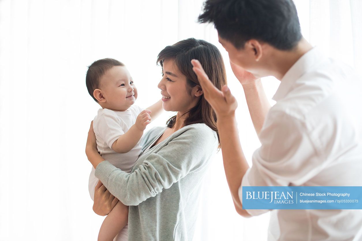Happy young Chinese family-High-res stock photo for download