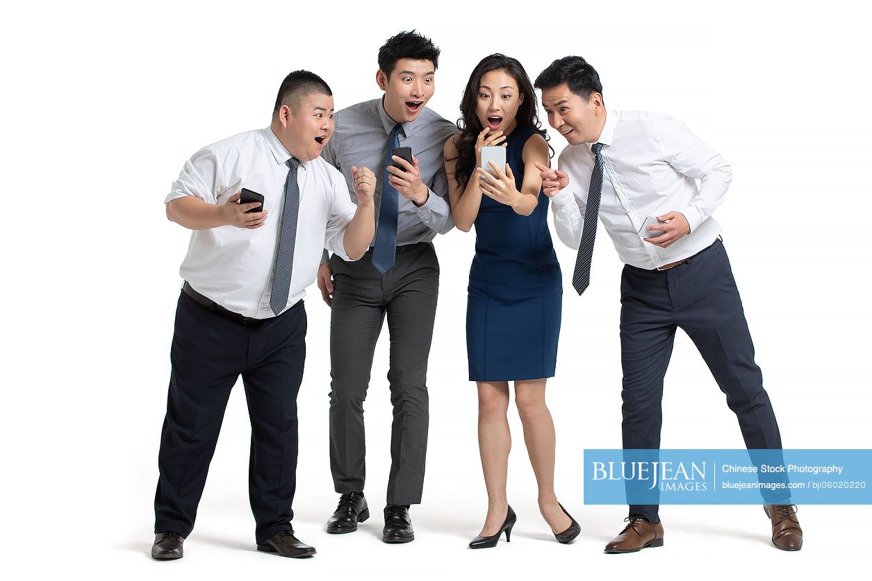Chinese business people using smartphone-High-res stock photo for download
