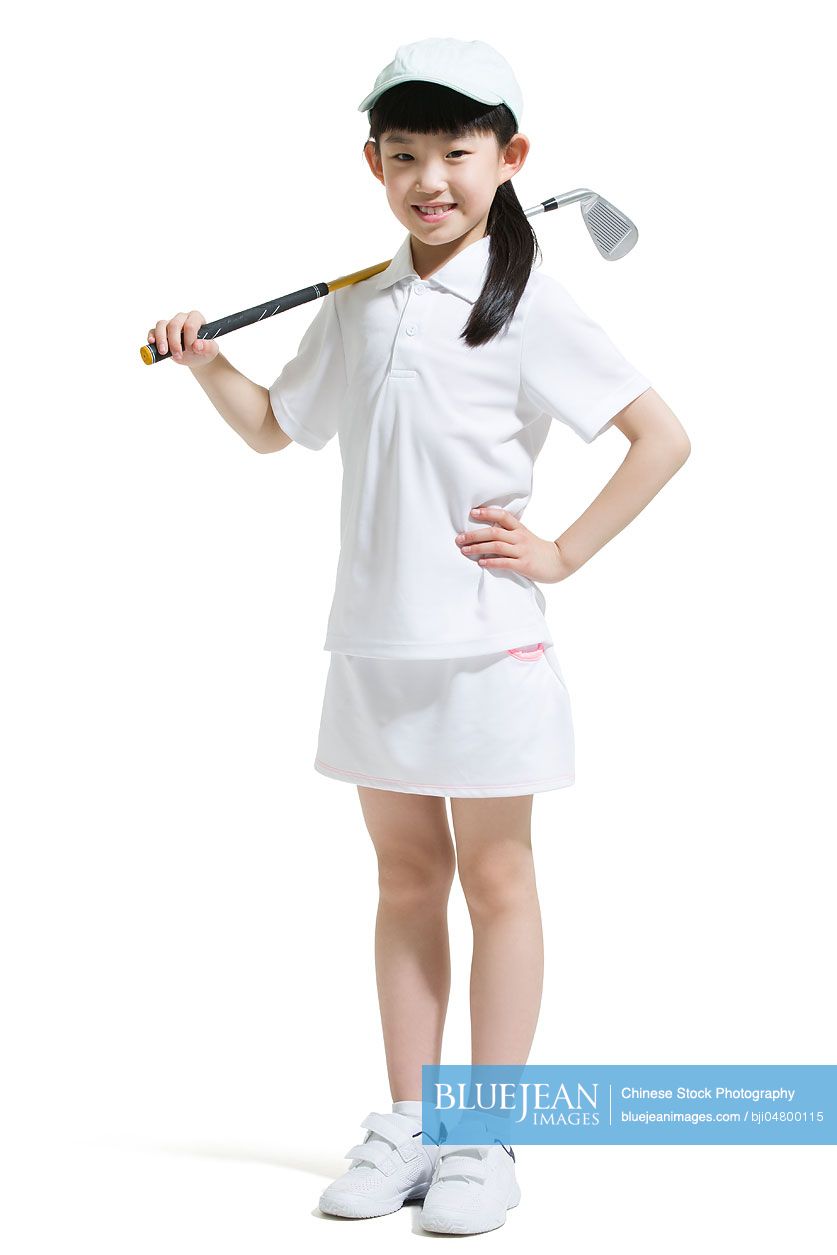 Cute Chinese girl playing golf-High-res stock photo for download
