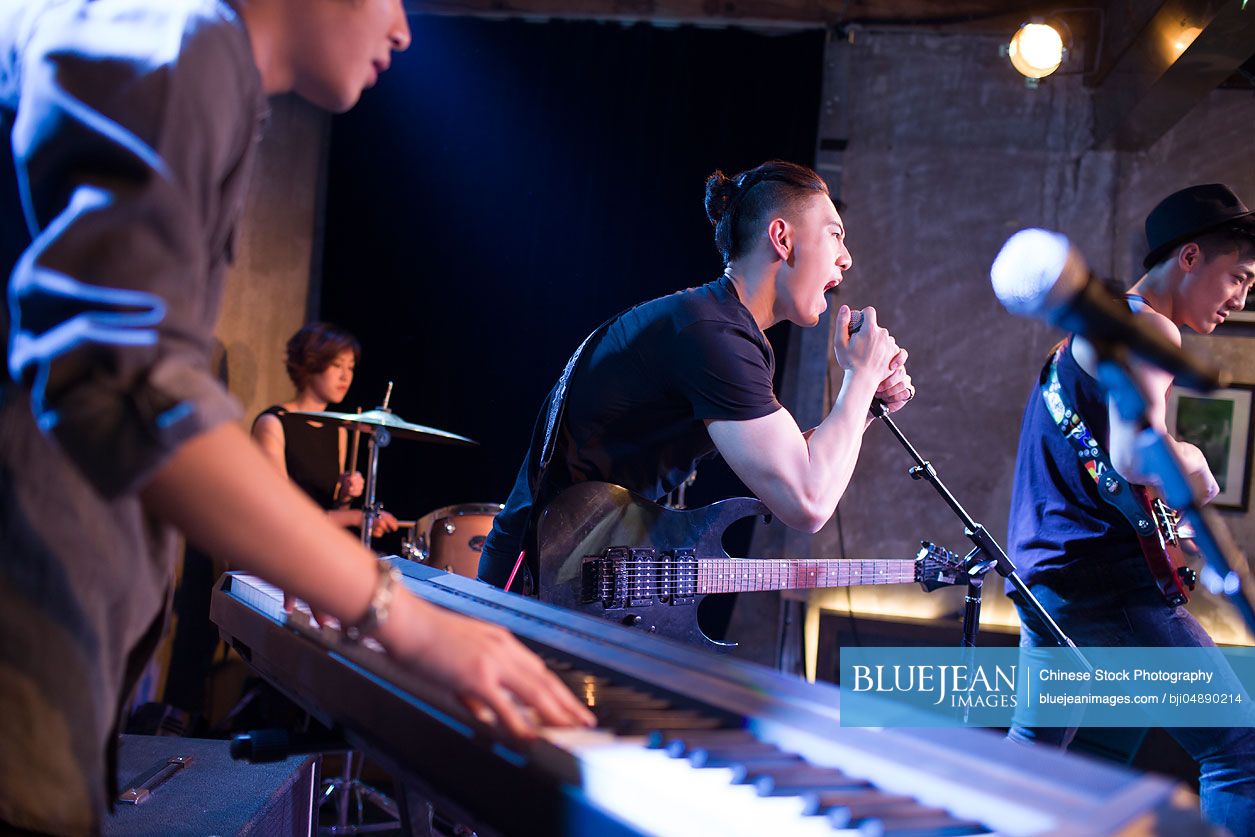 Chinese musical band performing on stage-High-res stock photo for download