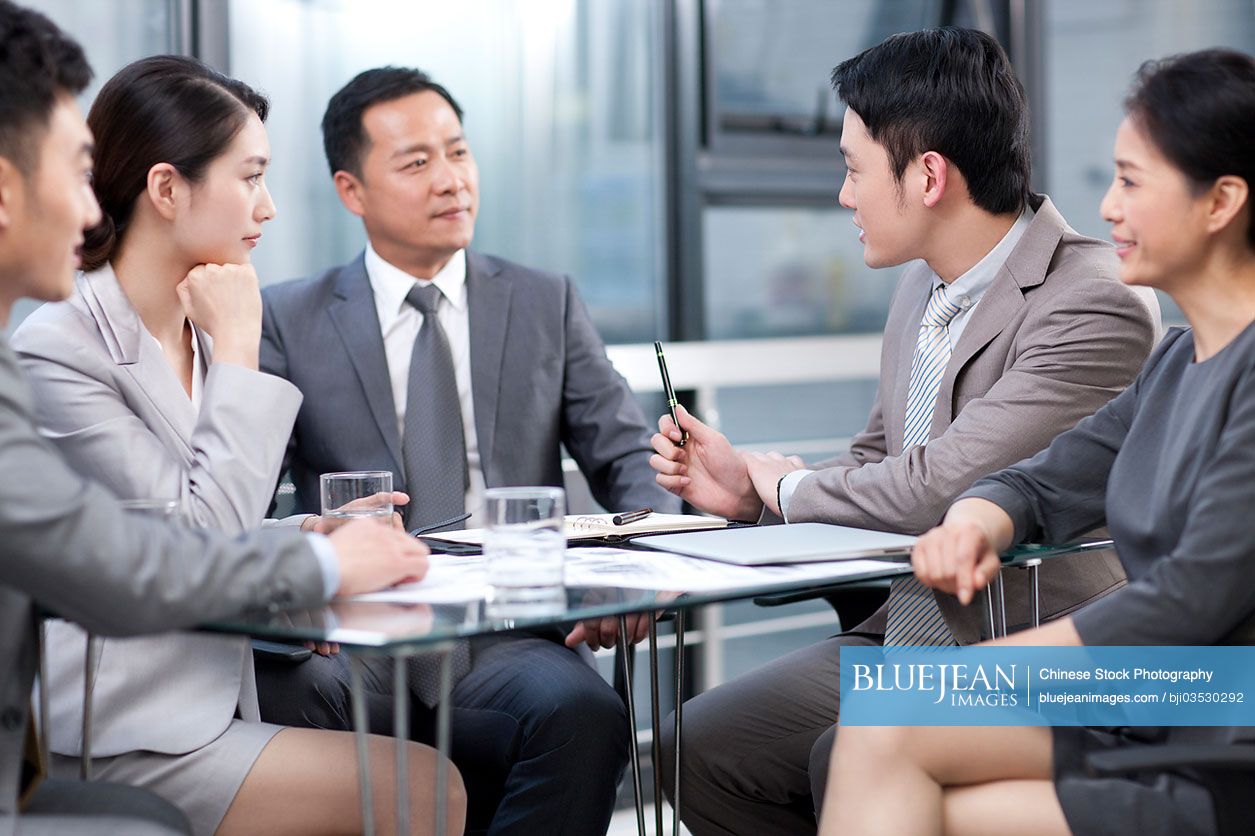 Chinese business team having a meeting-High-res stock photo for download