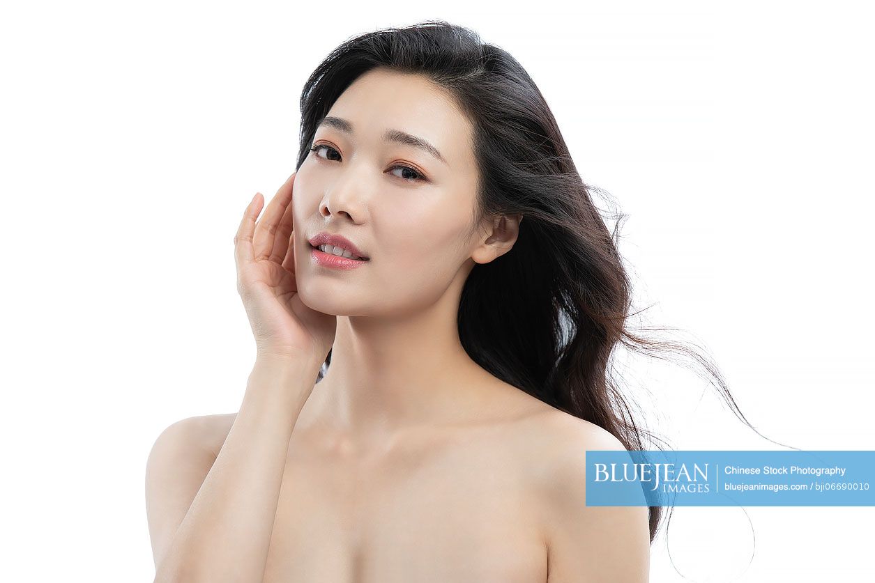 Studio shot of young beautiful Chinese woman-High-res stock photo for download