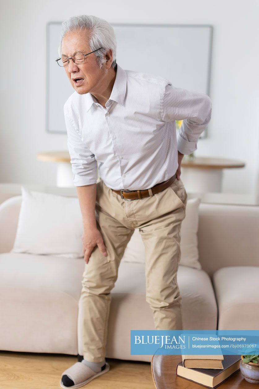 Senior Chinese man suffering from backache-High-res stock photo for ...