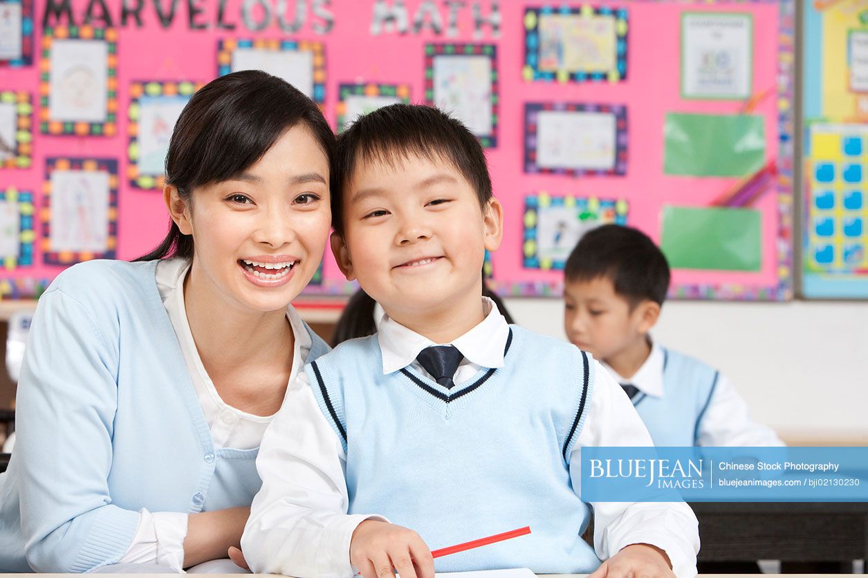 Chinese teacher and student smiling in class-High-res stock photo for ...