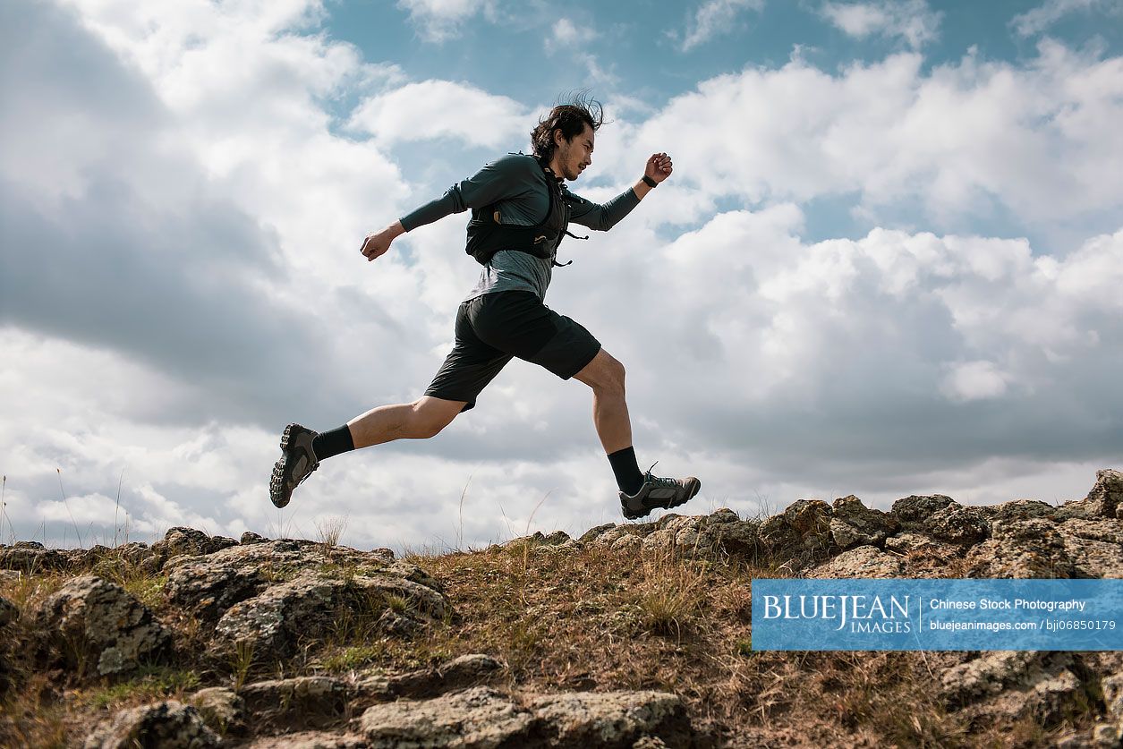 Chinese male trail runner training in nature-High-res stock photo for ...