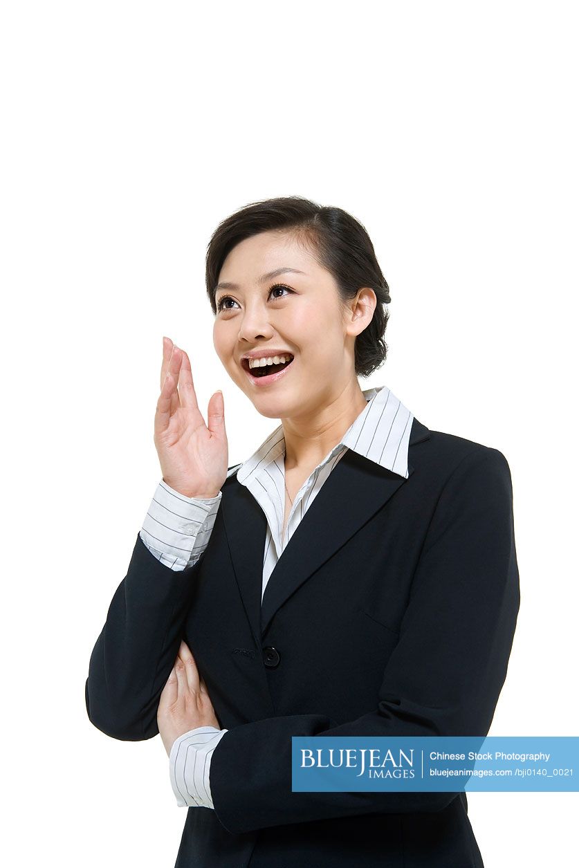 Chinese businesswoman in suit on light background-High-res stock photo ...