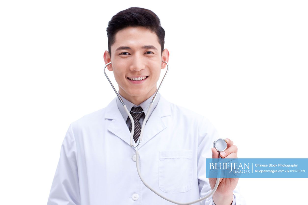 Male Chinese doctor with stethoscope-High-res stock photo for download