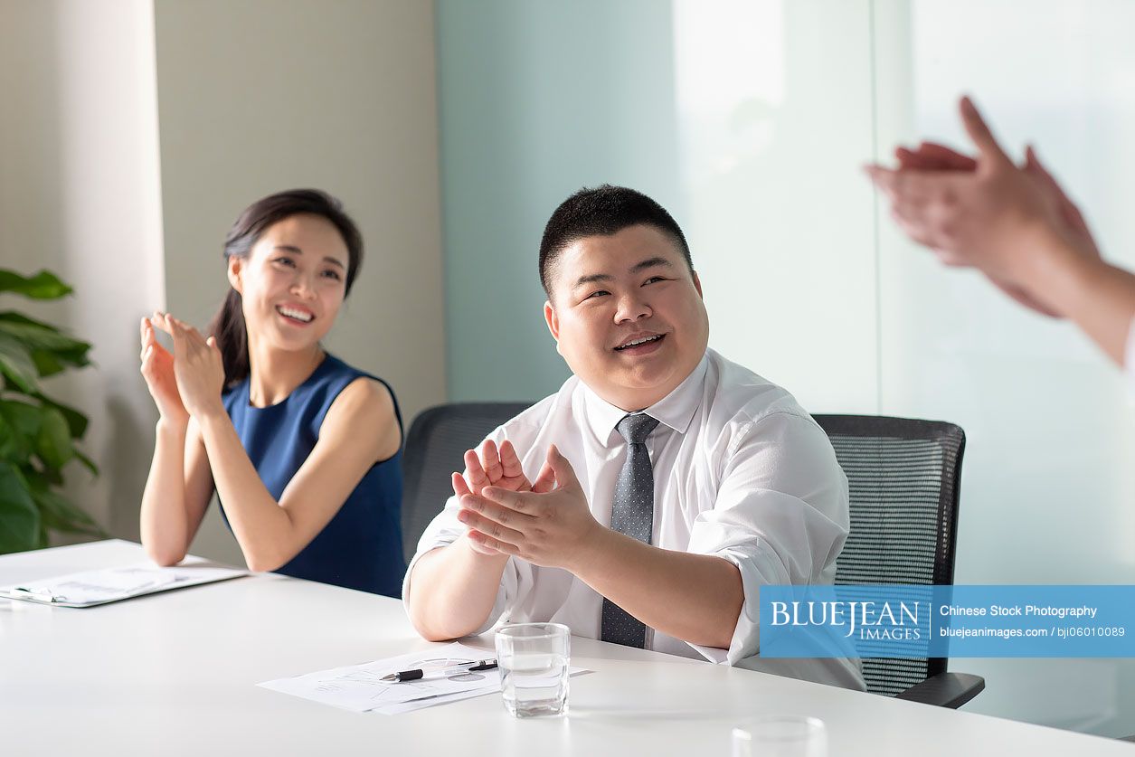 Confident Chinese business people having a meeting-High-res stock photo ...