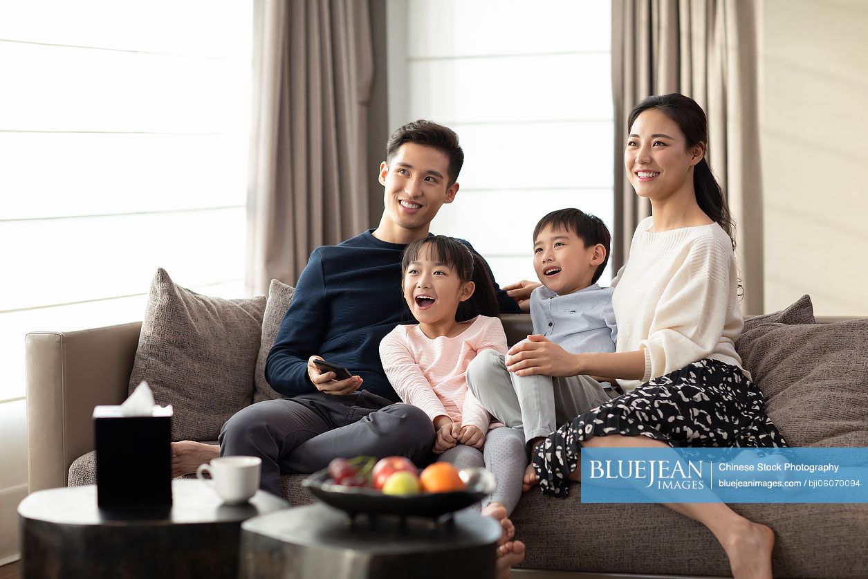 Young Chinese family and smart home-High-res stock photo for download