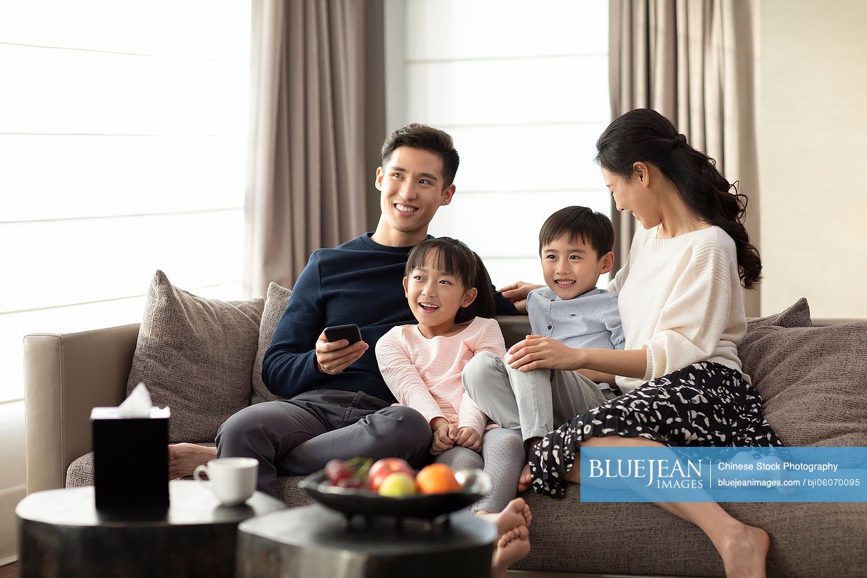 Young Chinese family and smart home-High-res stock photo for download