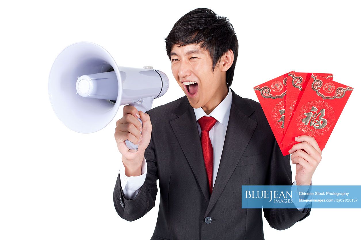Chinese businessman shouting into a megaphone-High-res stock photo for ...