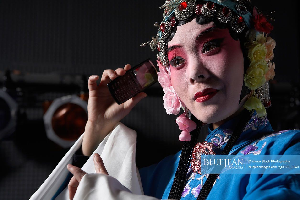 Chinese Woman Wearing Traditional Clothing, Holding A Cell phone-High ...