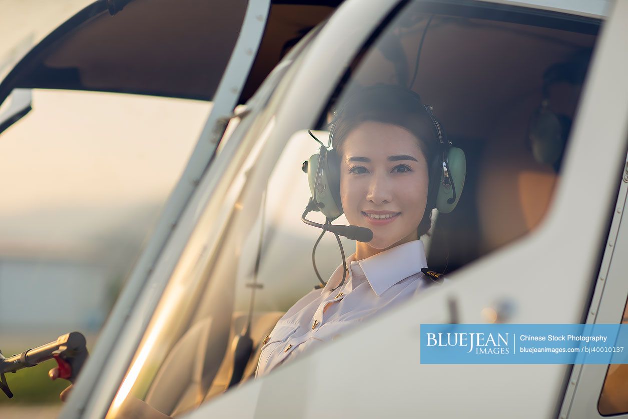 Chinese pilot sitting in helicopter cockpit-High-res stock photo for ...
