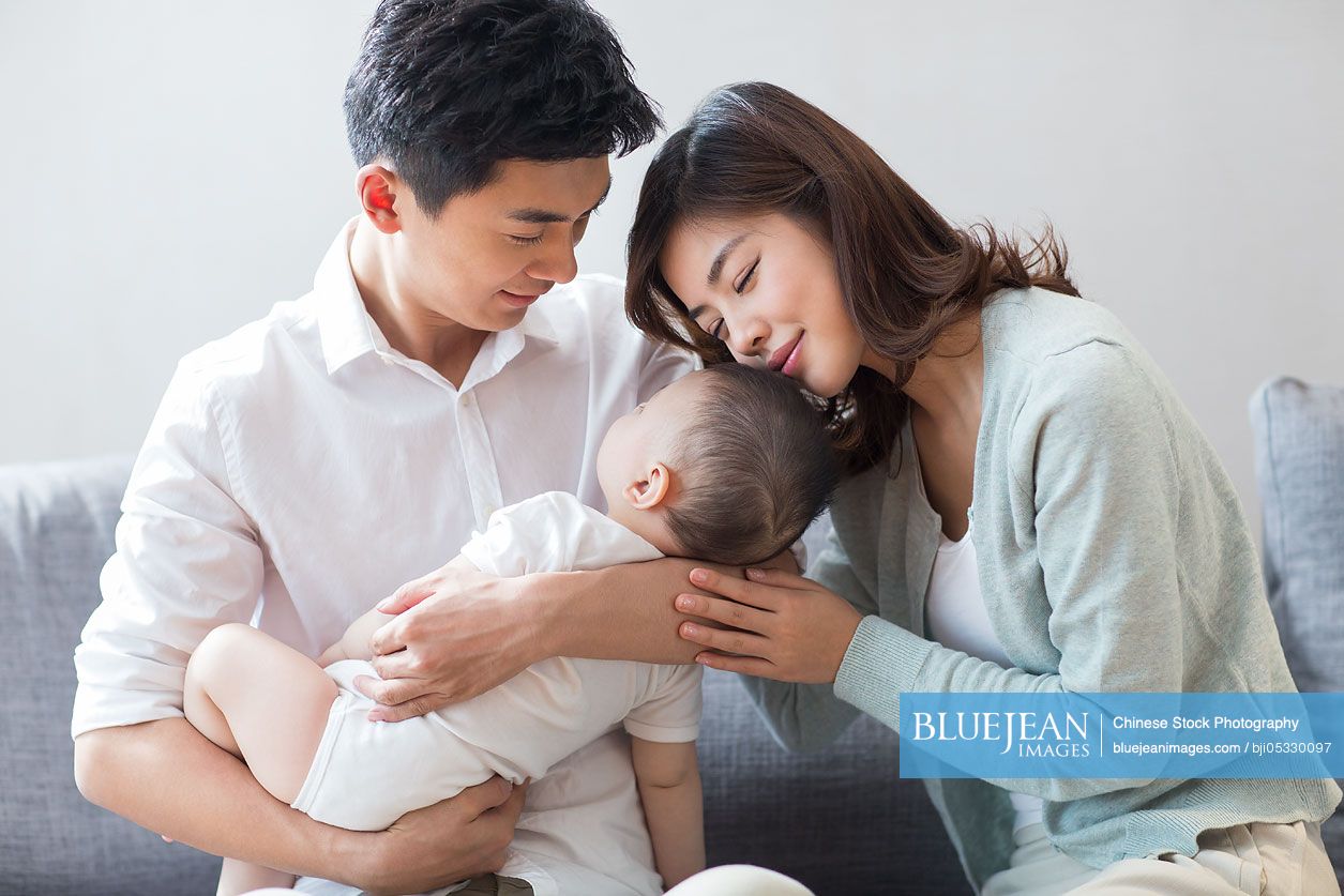 Happy young Chinese family-High-res stock photo for download