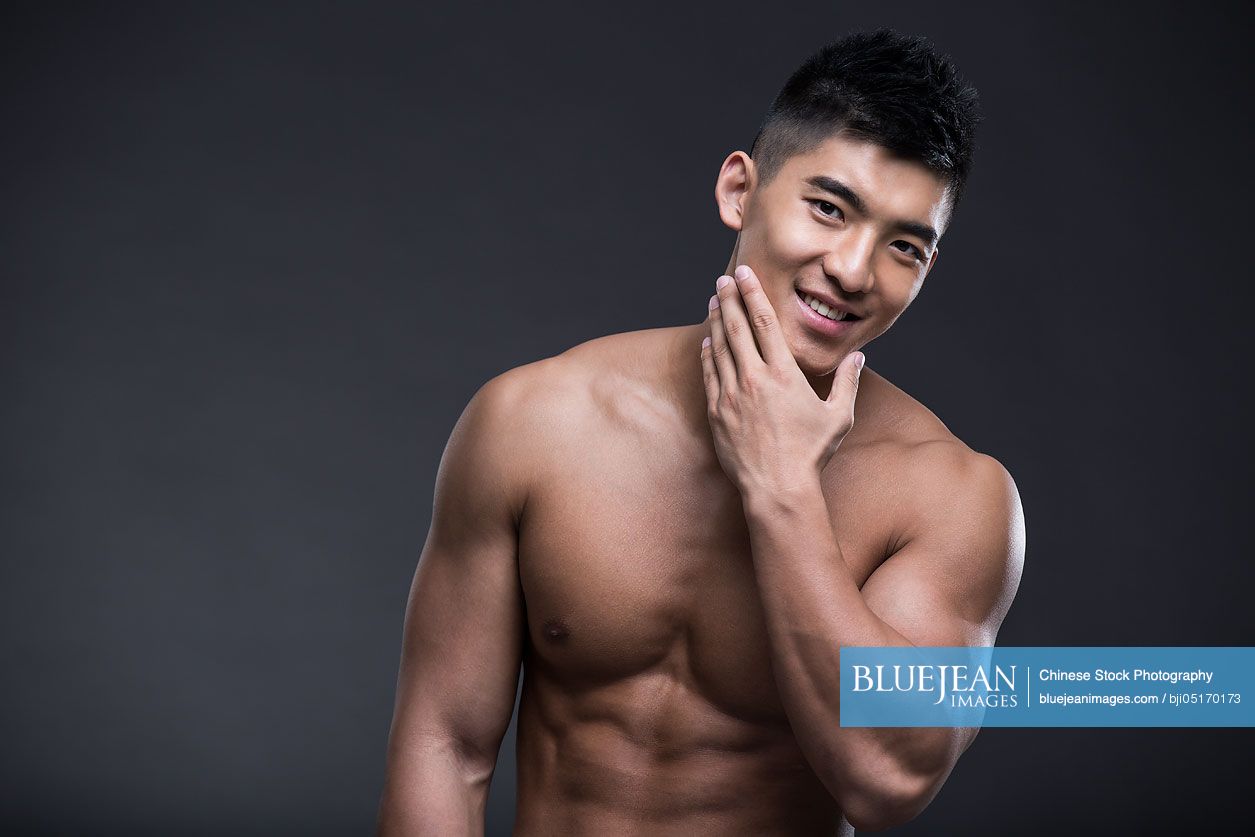 Portrait of young Chinese muscular man-High-res stock photo for download