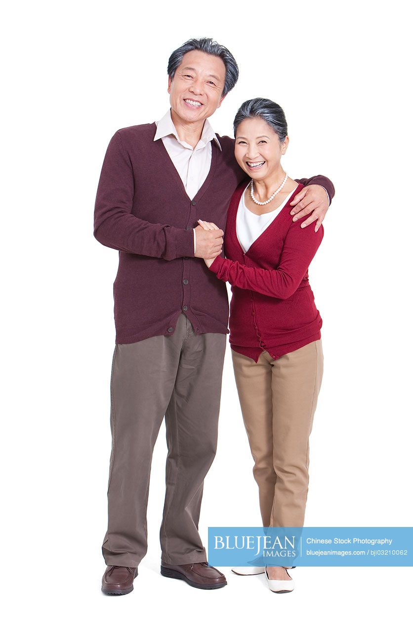 Happy senior Chinese couple holding hands-High-res stock photo for download
