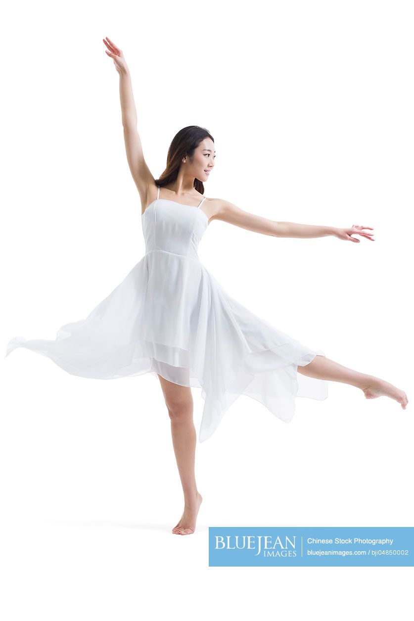 Young Chinese woman dancing-High-res stock photo for download
