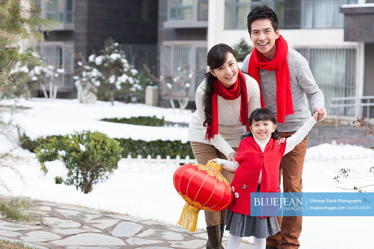 Cheerful Chinese family celebrating new year-High-res stock photo for ...