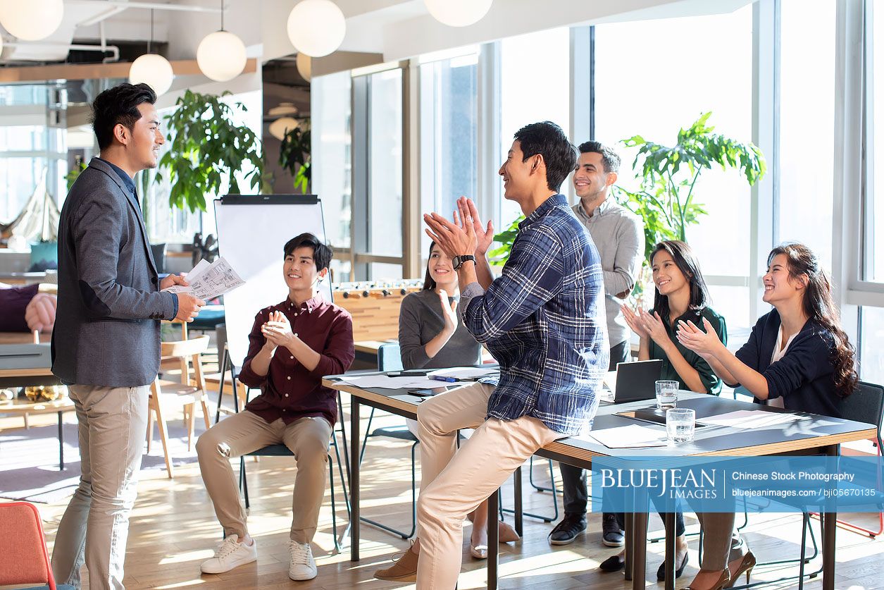 Young abroad students applauding in seminar-High-res stock photo for ...