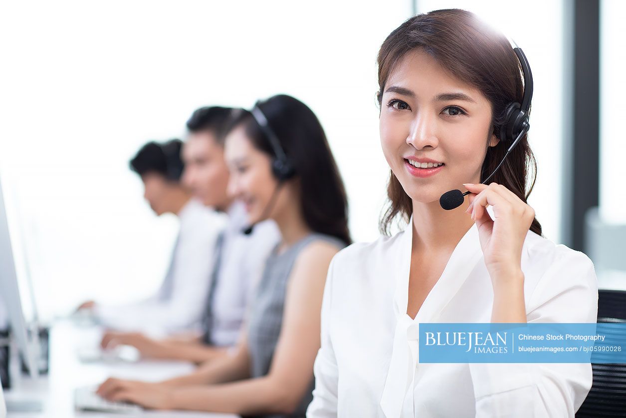 Professional Chinese Customer Service Staff In Office High res Stock Professional Chinese Customer Service Staff In Office High res Stock
