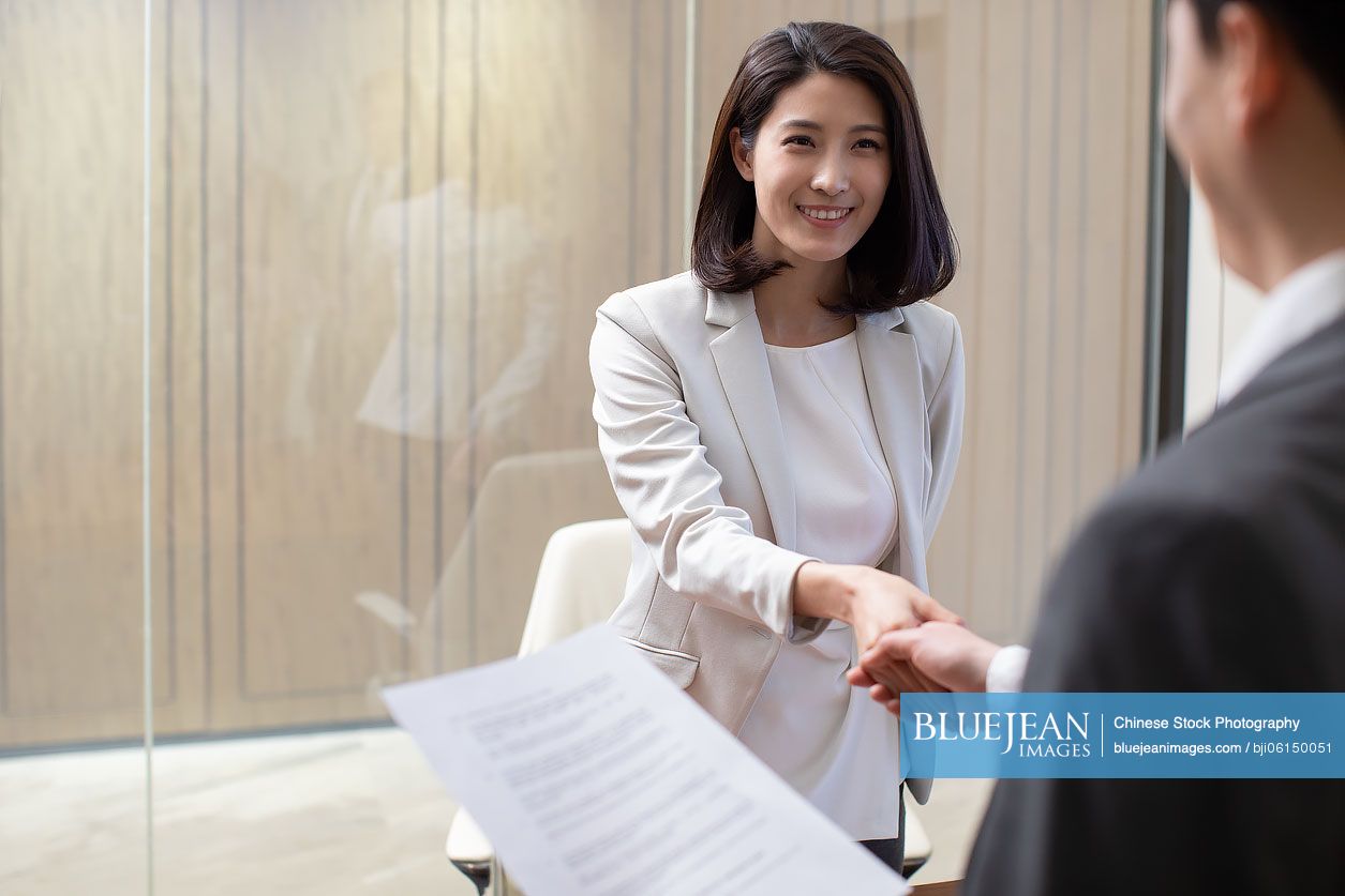 Young Chinese businesswoman in job interview-High-res stock photo for ...