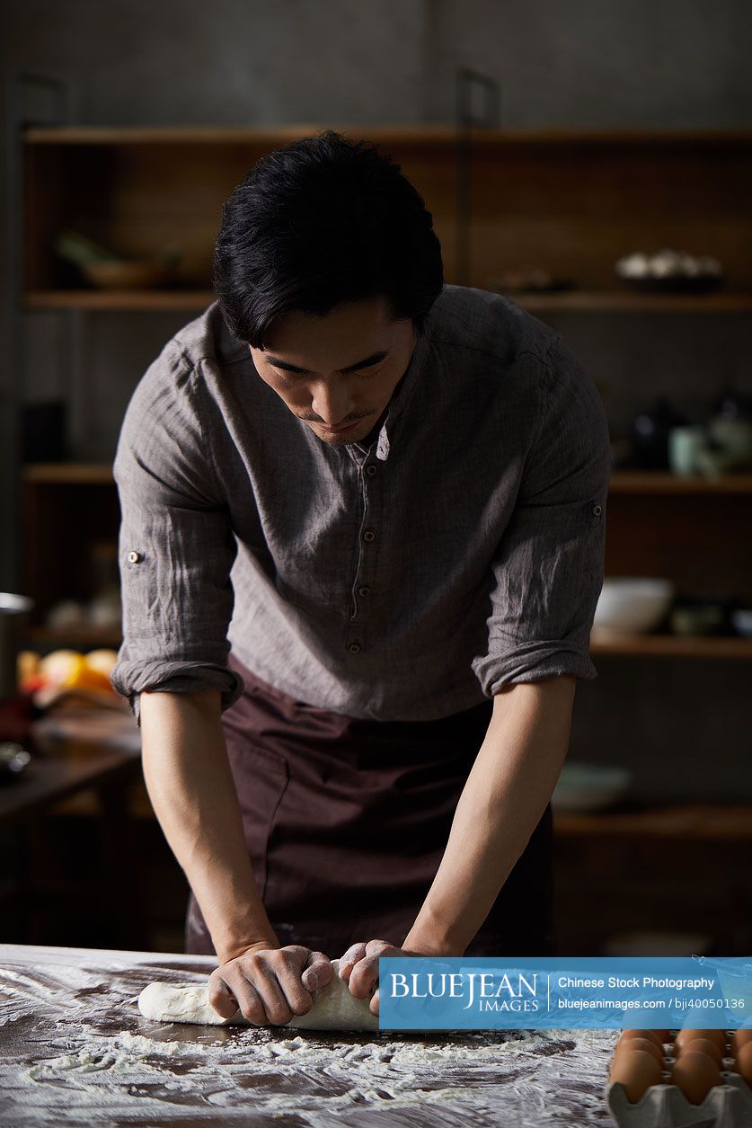 Chinese cook making wheaten food-High-res stock photo for download