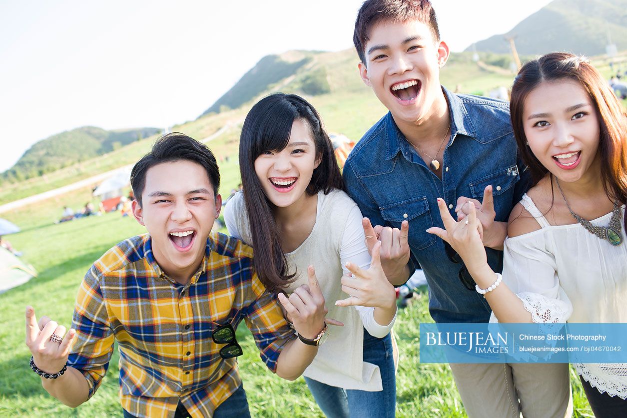 Happy Chinese friends at music festival-High-res stock photo for download
