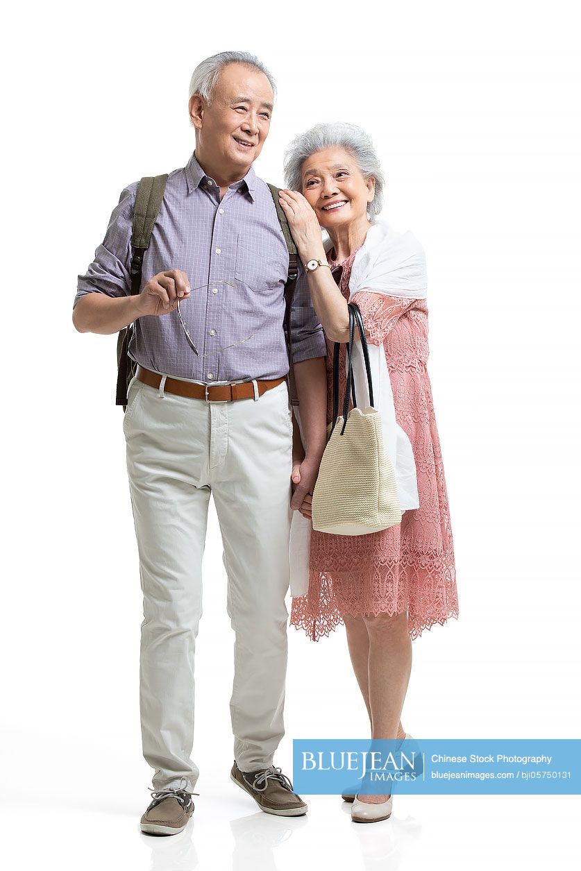 Happy senior Chinese couple holding hands-High-res stock photo for download