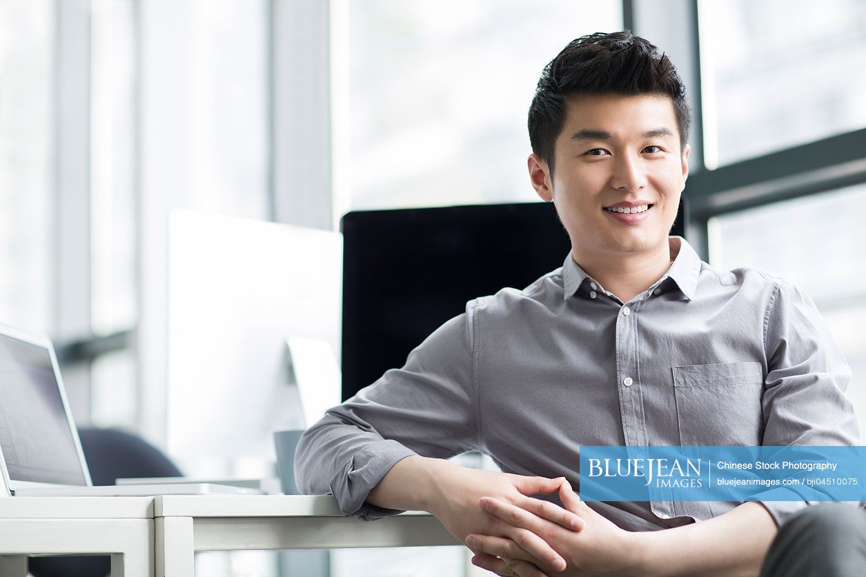 Portrait of young Chinese businessman-High-res stock photo for download
