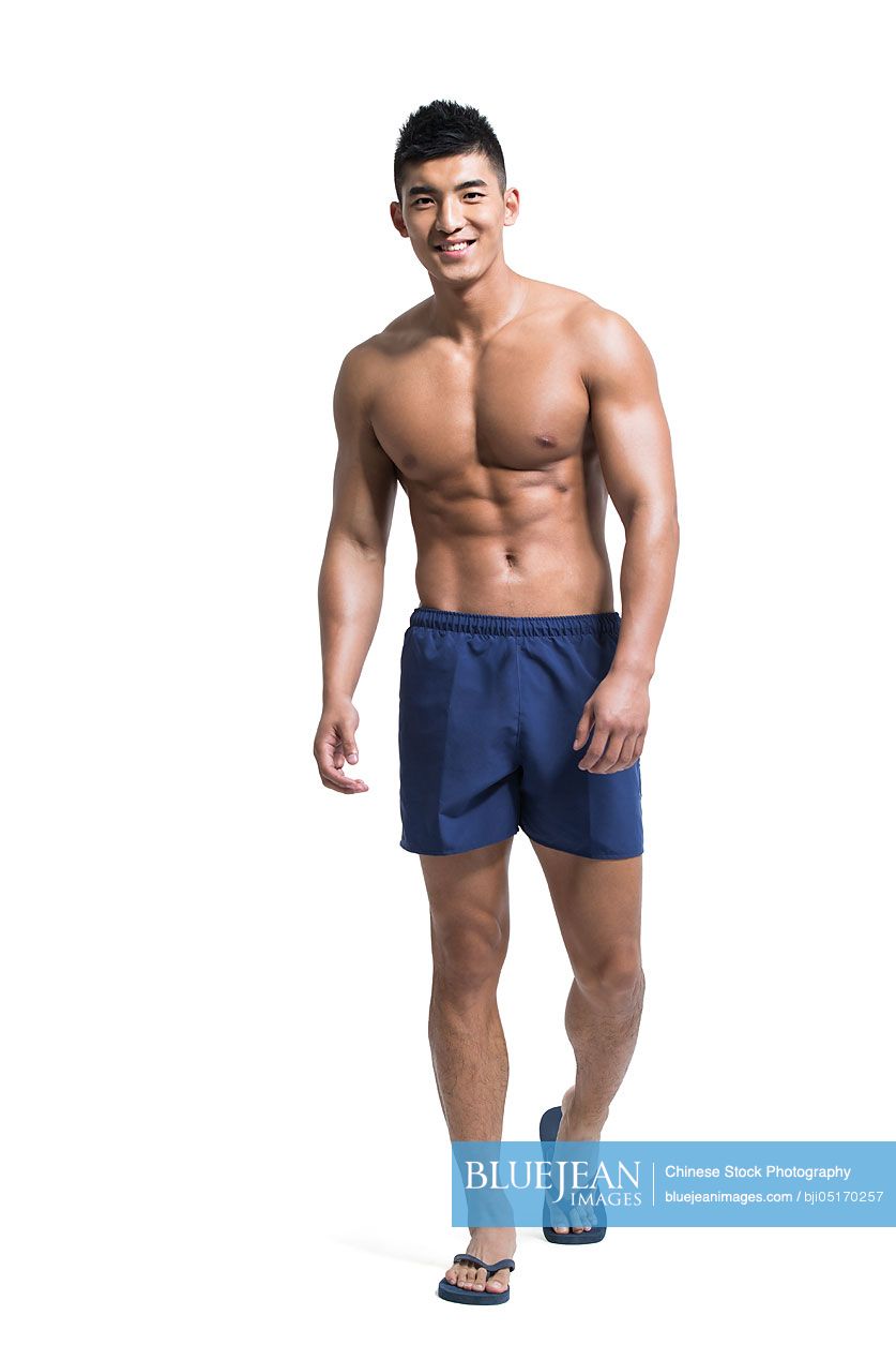 Young Chinese muscular man wearing swimming trunks-High-res stock photo ...