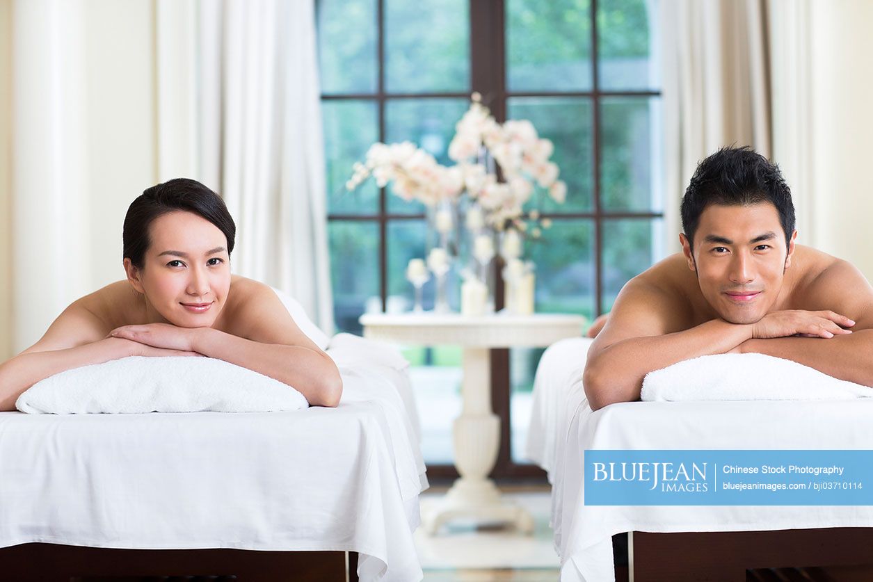 Young Chinese couple ready for spa treatment-High-res stock photo for ...