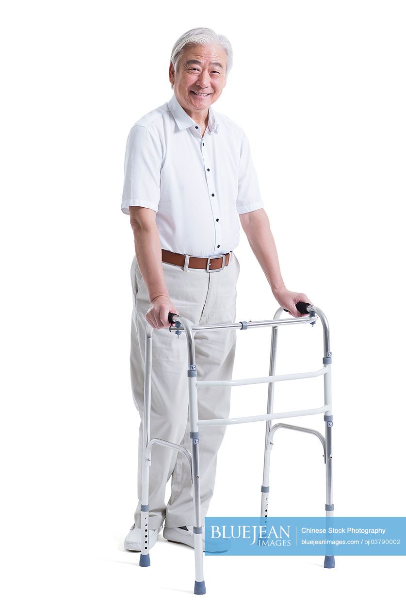 Happy senior Chinese man with walker-High-res stock photo for download