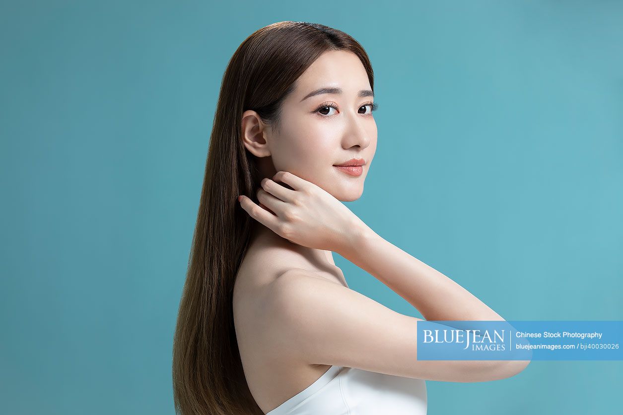 Studio shot of beautiful young Chinese woman-High-res stock photo for download