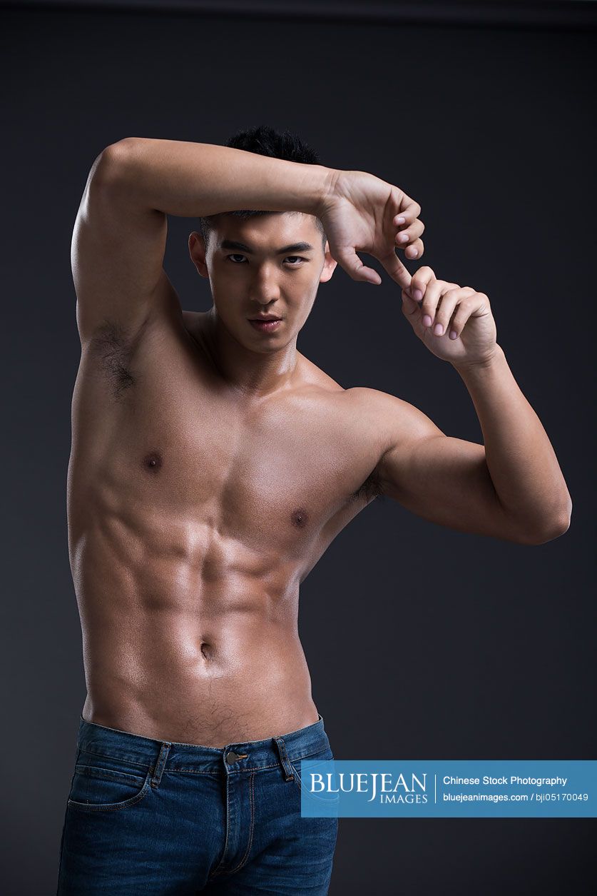 Portrait of young Chinese muscular man-High-res stock photo for download