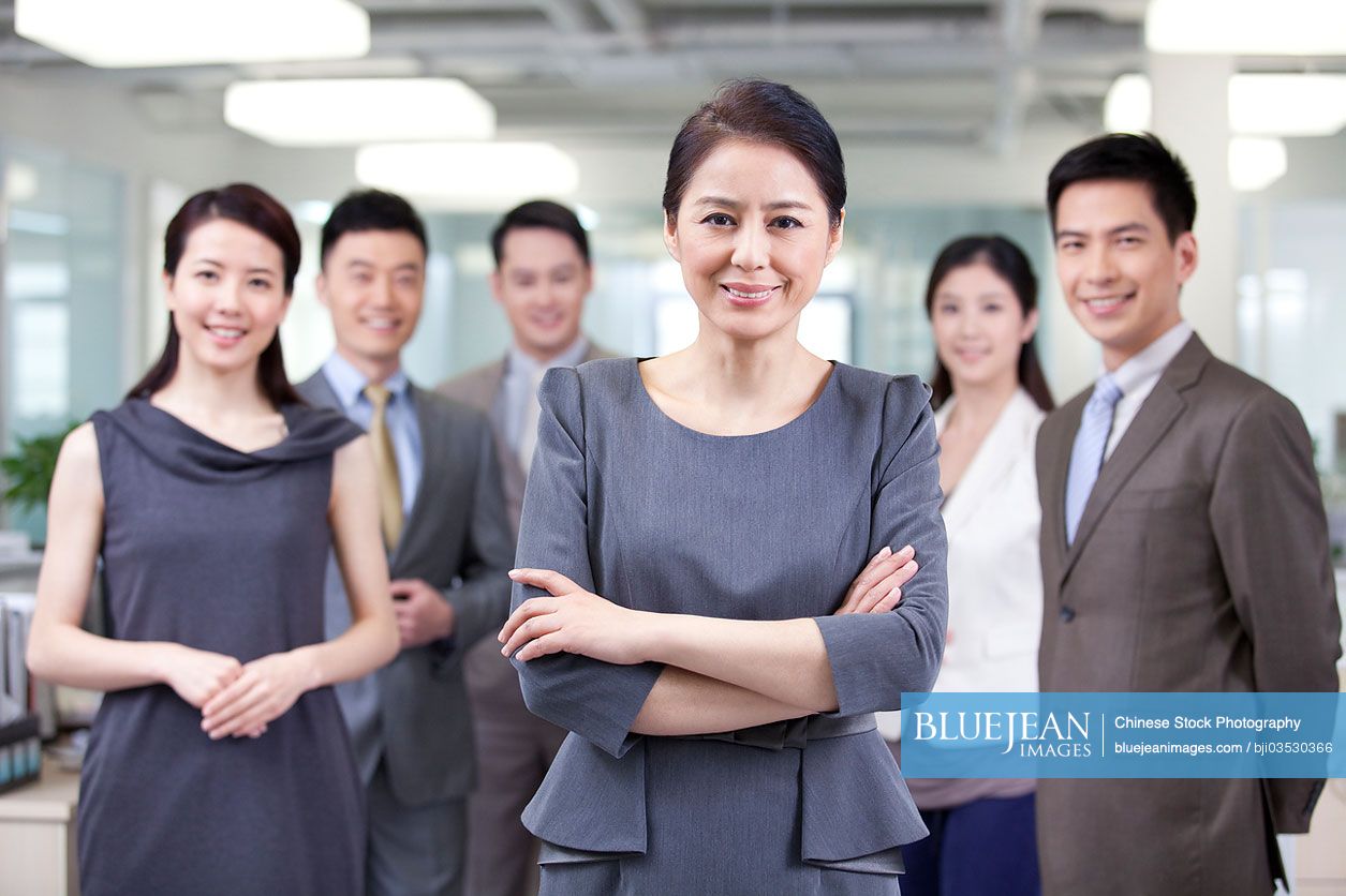 Portrait of confident Chinese business team-High-res stock photo for ...