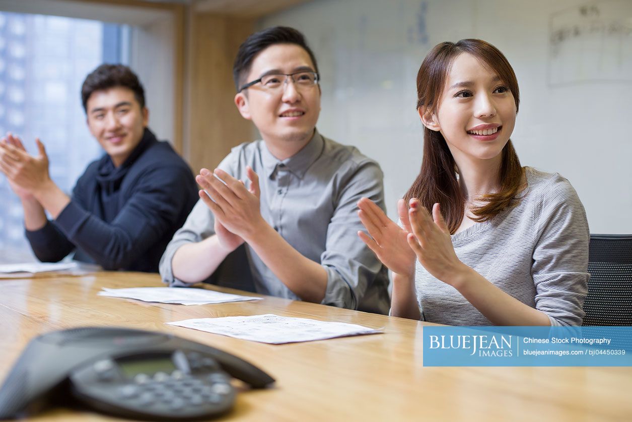 Chinese business people clapping in board room-High-res stock photo for ...