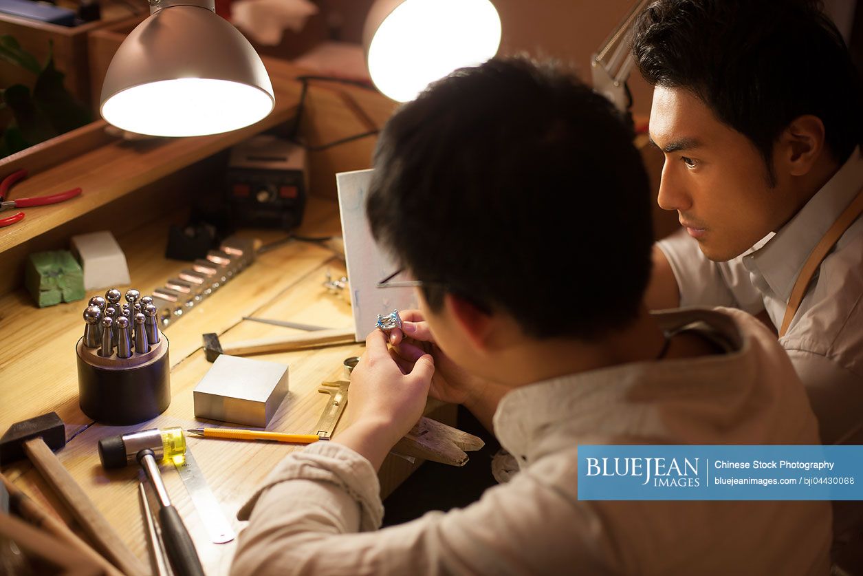Chinese jewelers making sapphire ring-High-res stock photo for download