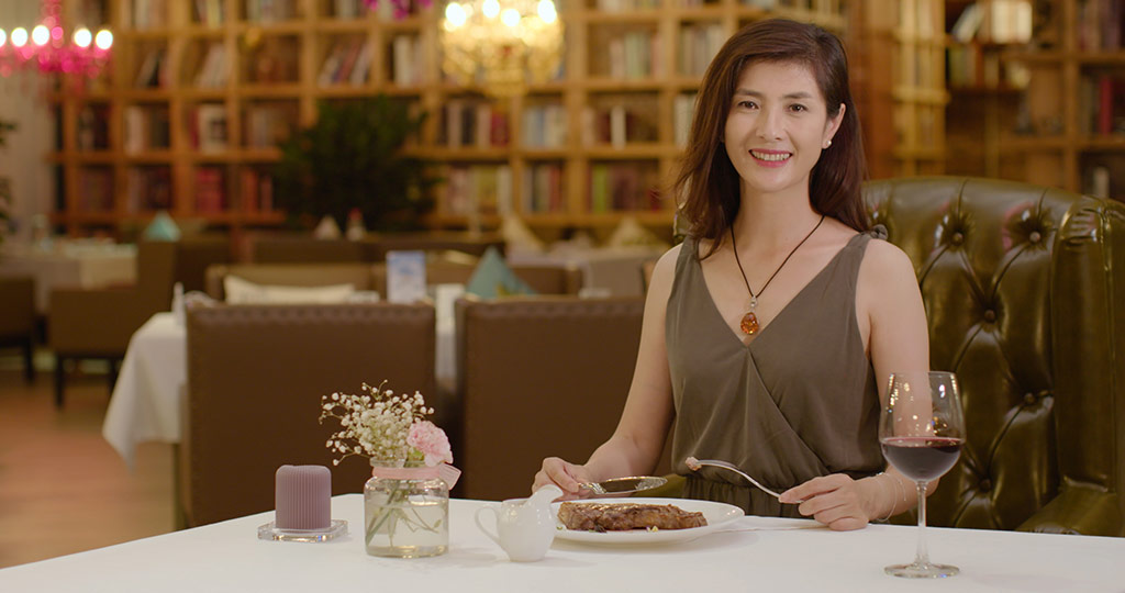 Beautiful Chinese woman eating dinner at restaurant,4K-High-res stock ...