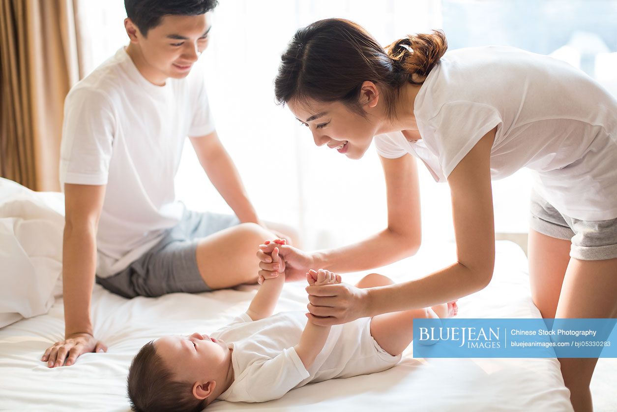 Happy young Chinese family-High-res stock photo for download