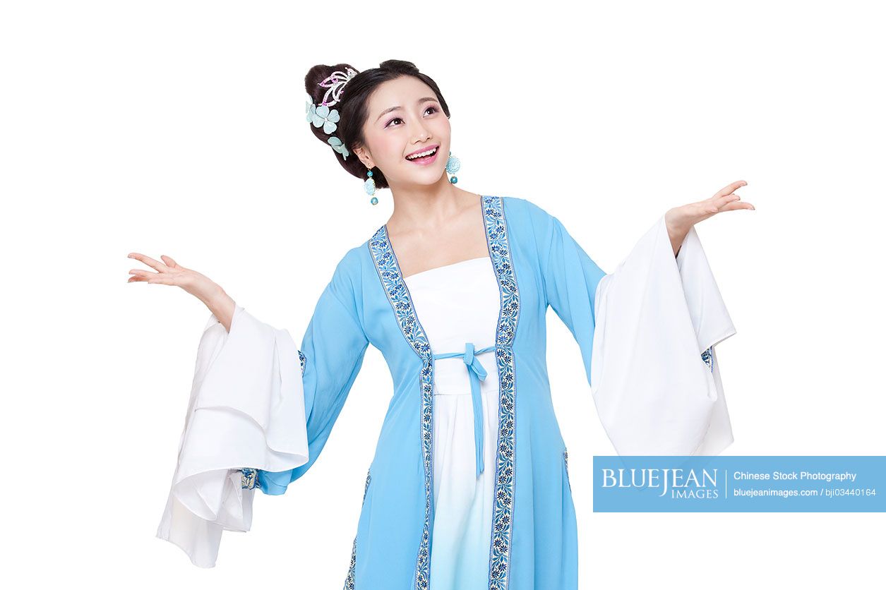 Young Chinese woman in Chinese traditional costume gesturing-High-res ...