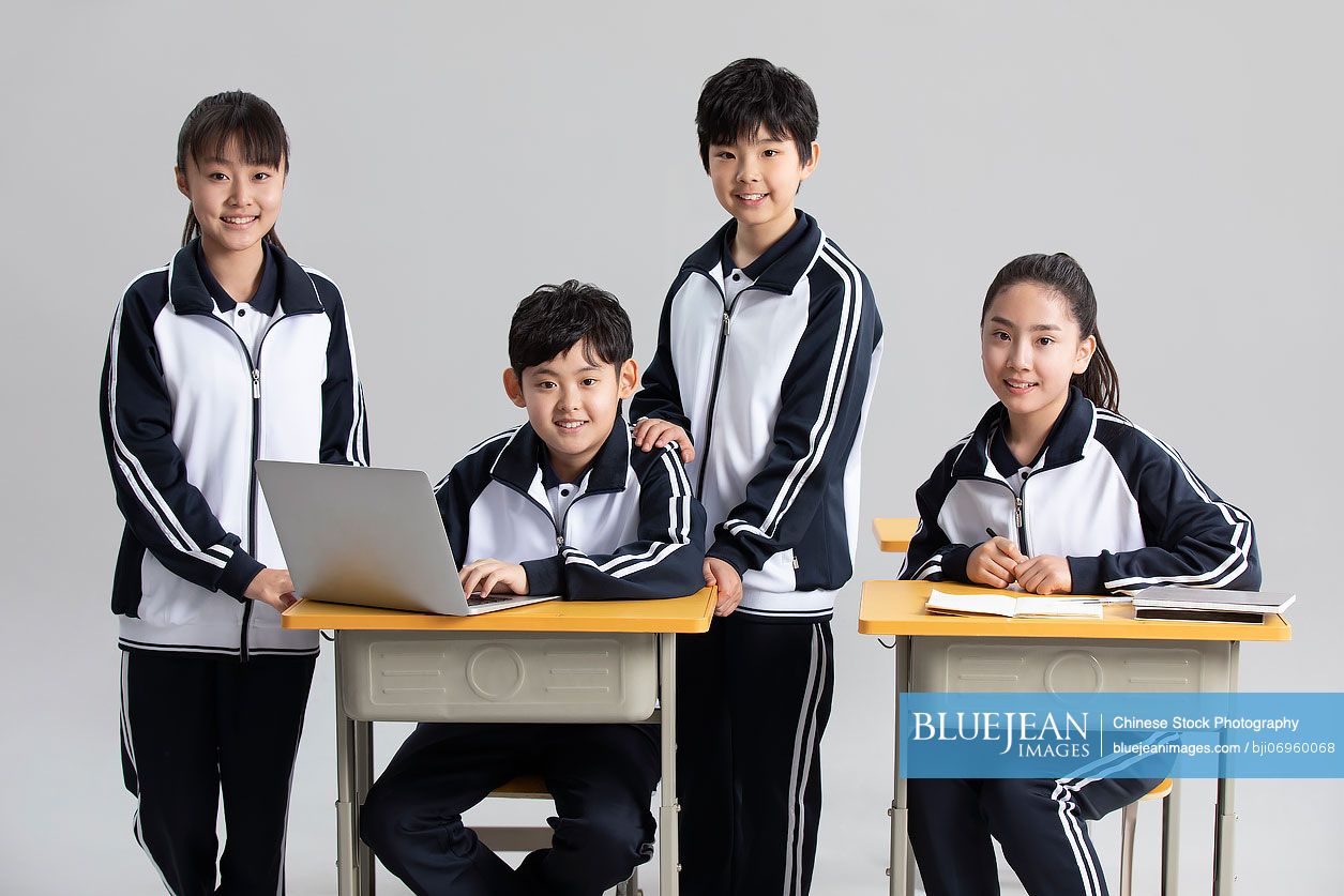 Chinese students learning with laptop in classroom-High-res stock photo ...