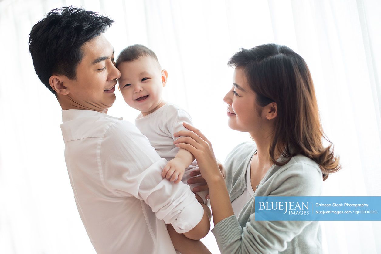 Happy young Chinese family-High-res stock photo for download