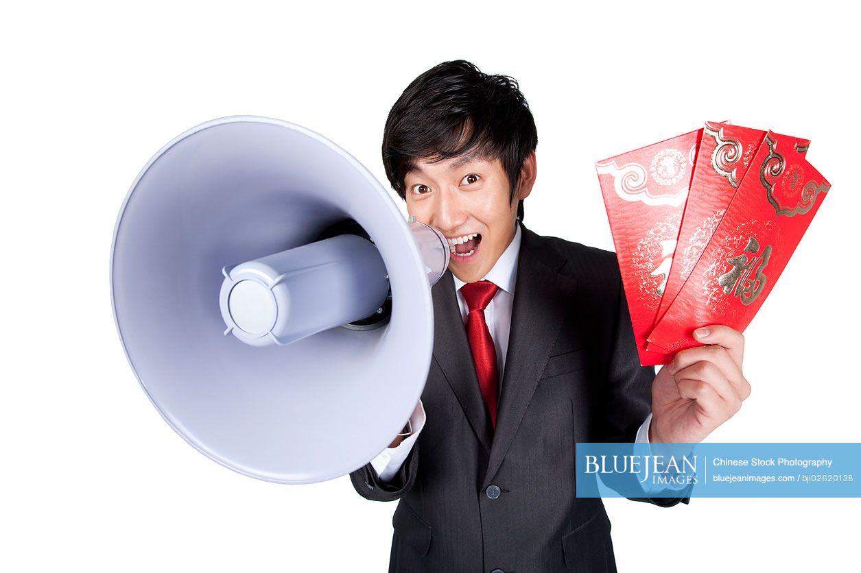 Chinese businessman shouting into a megaphone-High-res stock photo for ...