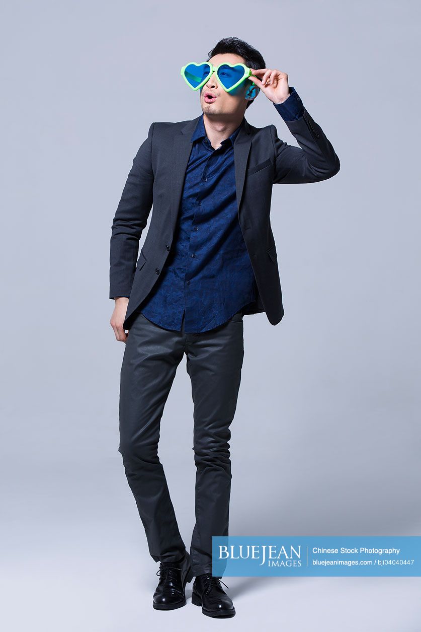 Hip Young Chinese Man Wearing Big Sunglasses High res Stock Photo For