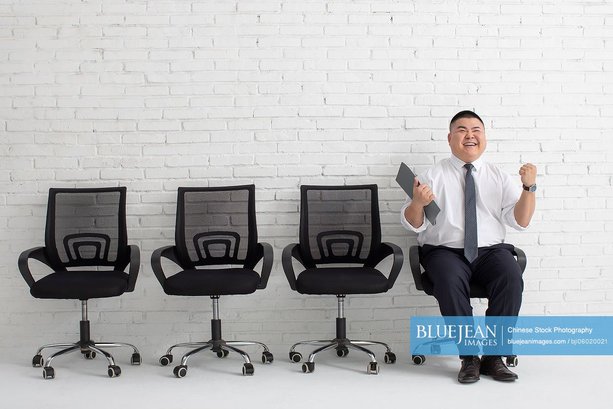 Young Chinese businessman waiting for job interview-High-res stock ...