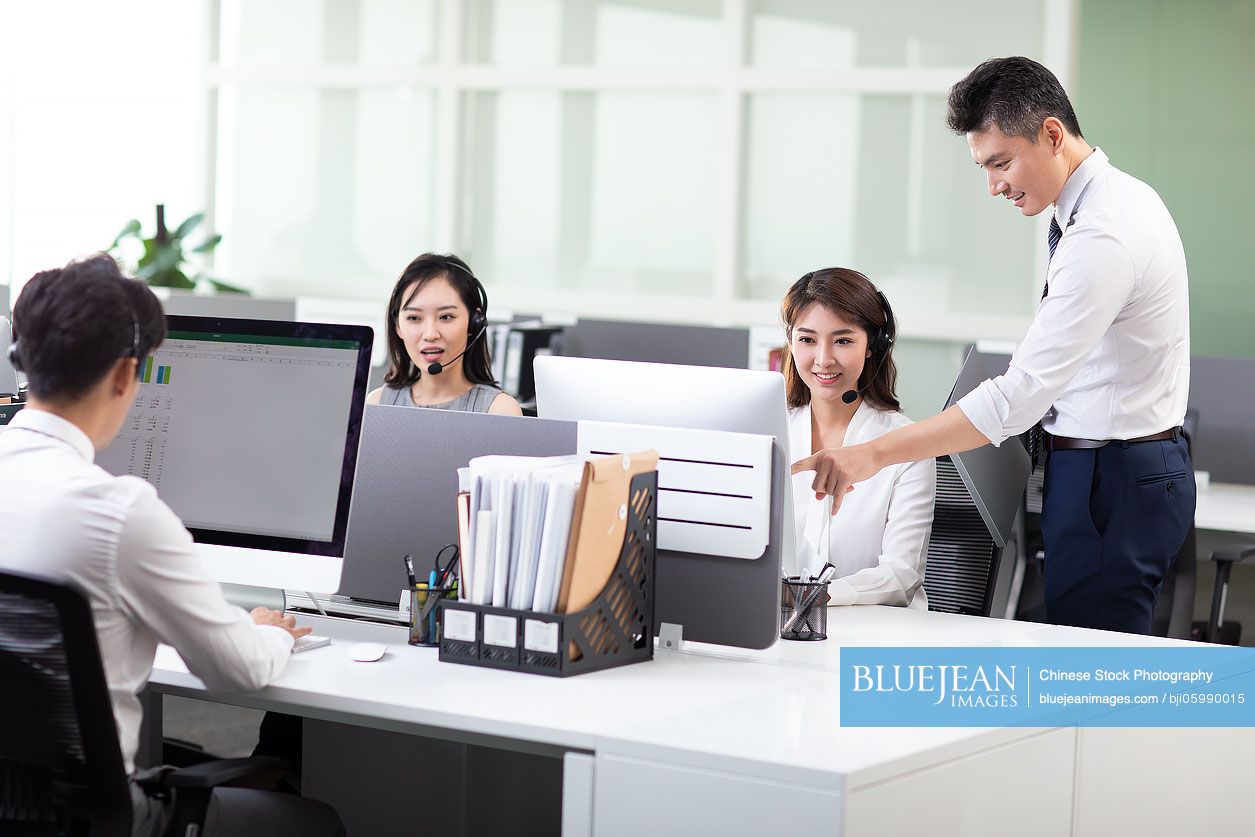 Chinese call center agents working in office-High-res stock photo for ...