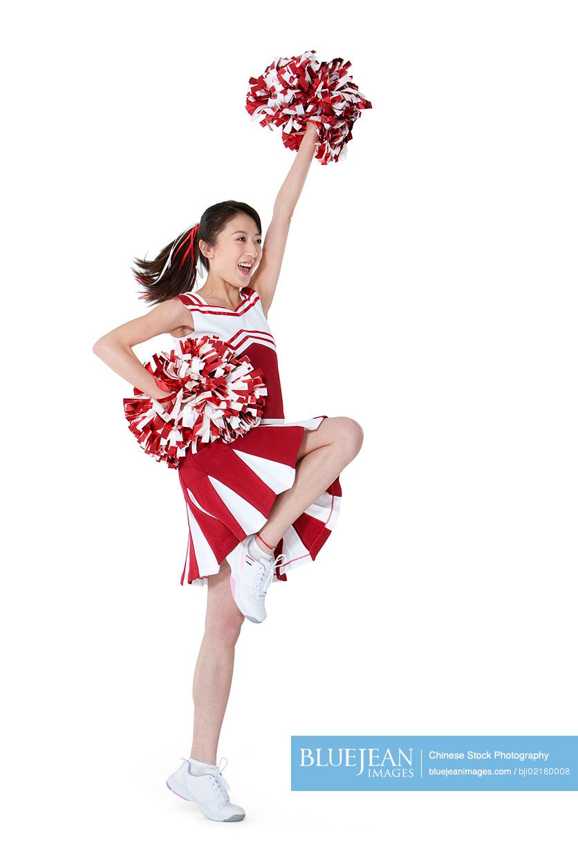 Chinese cheerleader in action with her pom-poms-High-res stock photo ...