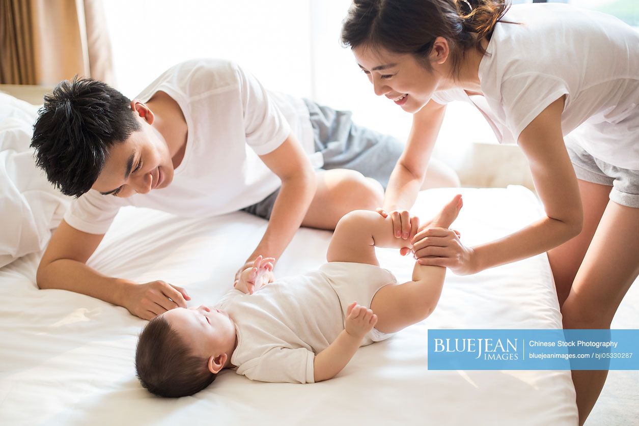 Happy young Chinese family-High-res stock photo for download