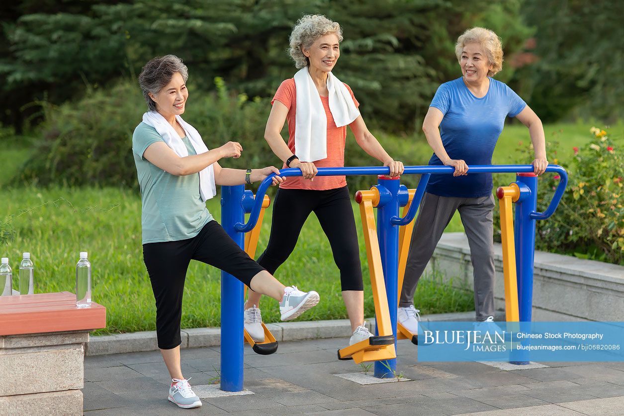 Happy senior Chinese friends exercising in park-High-res stock photo ...